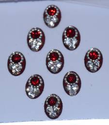 11 oval broad bindi with silver decorations - Kamal's Fashion - 607234