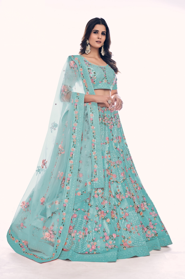 Turquoise embroidered net semi stitched lehenga - MESMORE - 4112385