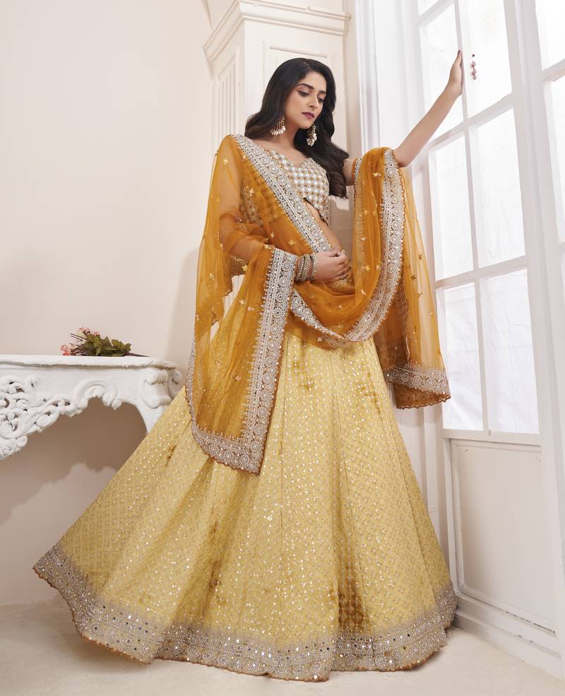 Yellow embroidered georgette semi stitched lehenga - MESMORE - 4129653