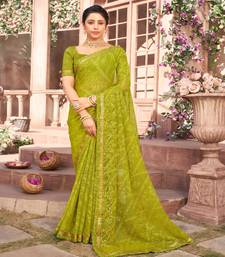 Green Color Brasso Saree With Attached Woven Border And Blouse Piece ...