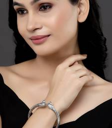 Sasha oxidised german silver bangle kada with peacock carvings - Sasha ...