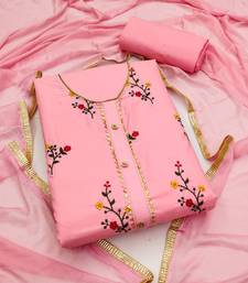 Elegance redefined in embroidered dress material suit - Griva Designer ...