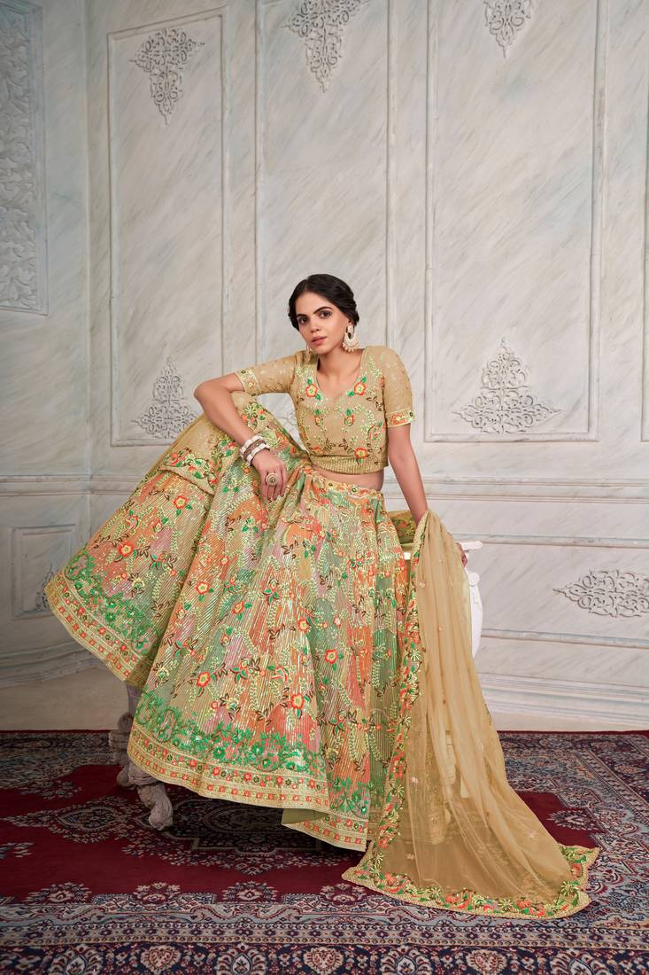 DESIGNER OUTFIT OF HALDI FOR BRIDE WITH BEAUTIFUL SEQUINS AND MEULTI ...
