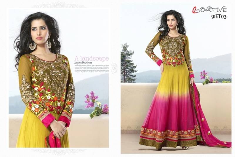 Vibrant Mehndi and Rani Color Anarkali suit is a mesmerising designer ...