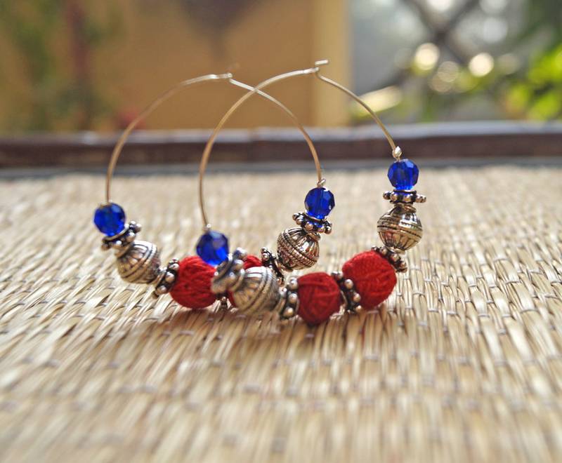 red ethnic hoops - Anetra - 1571648
