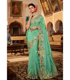 Tuquoise embroidered Viscose with golden smoke Festival wear saree with ...